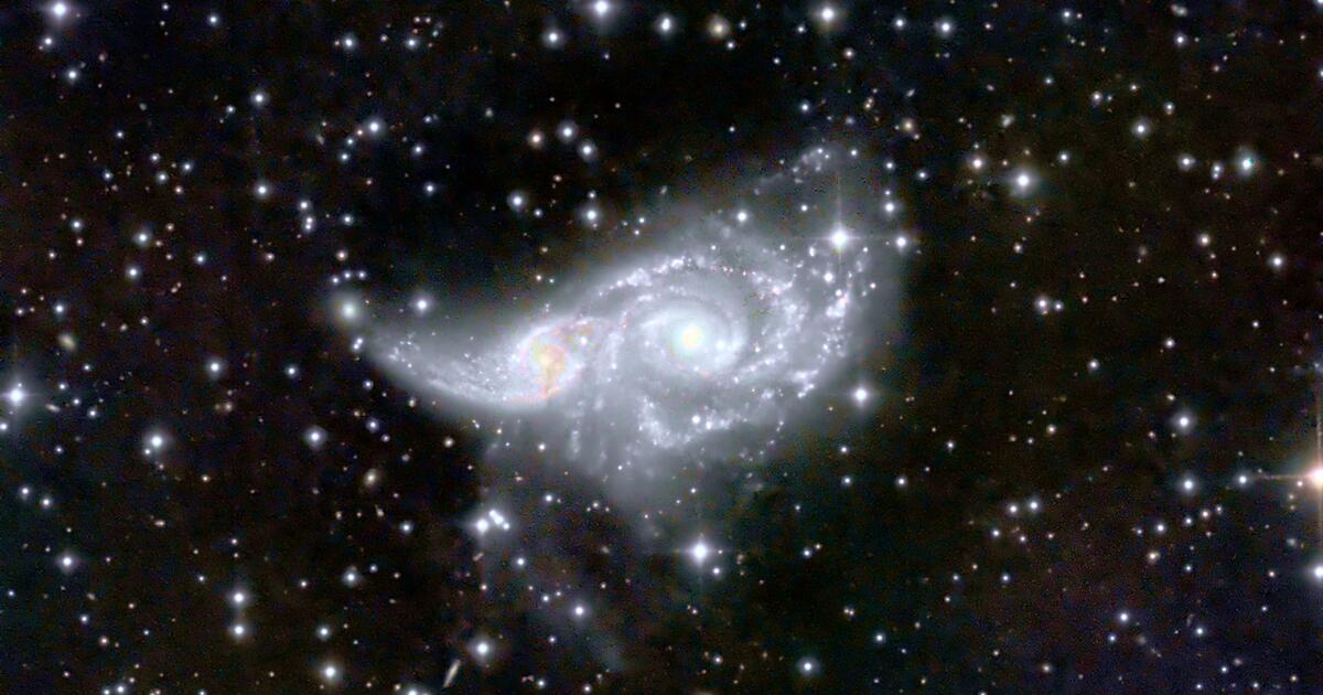 NGC2207 and IC2163 | Telescope Live
